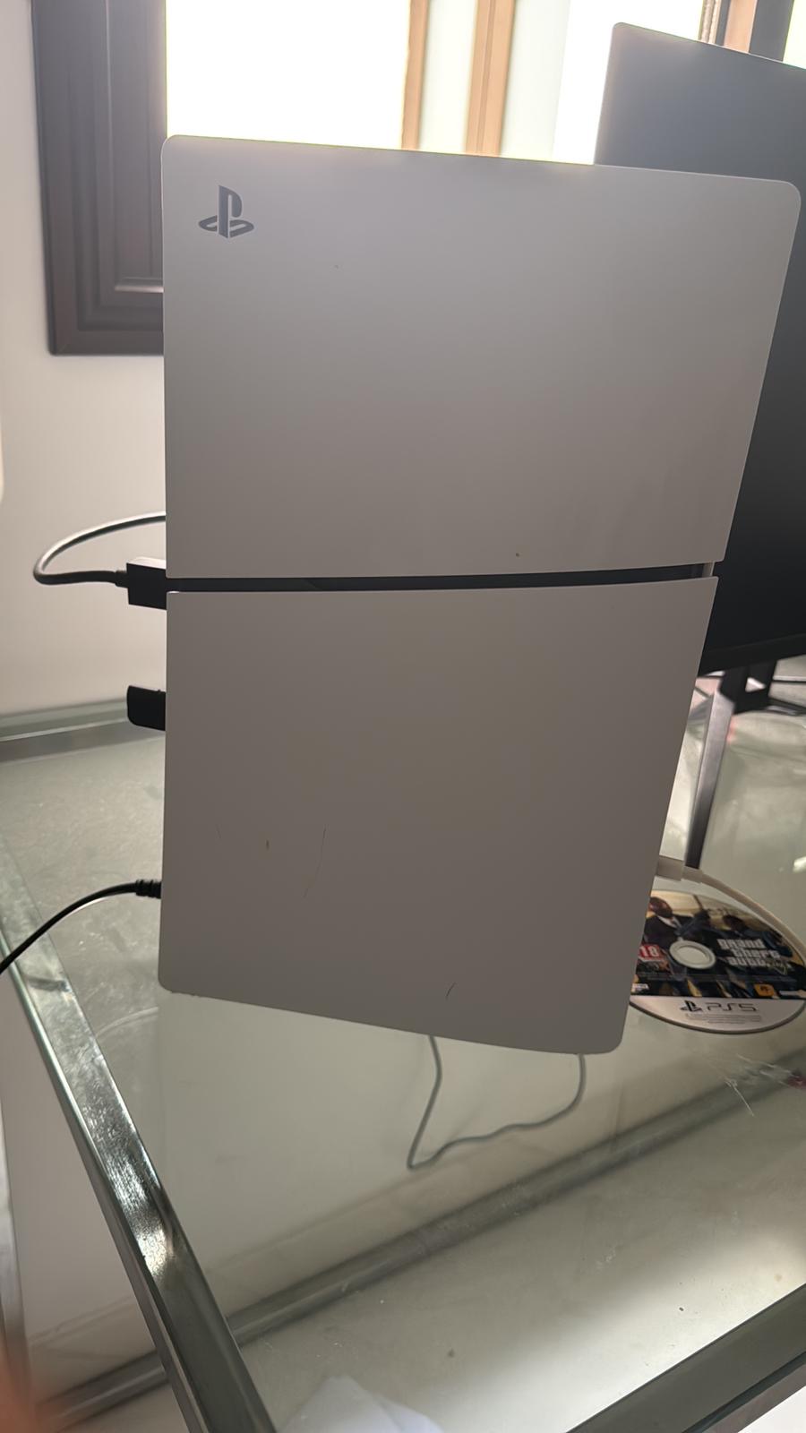 Voursa.com | Ps5 slim m3aha 3 CD GTA V , the crew , COD MW3